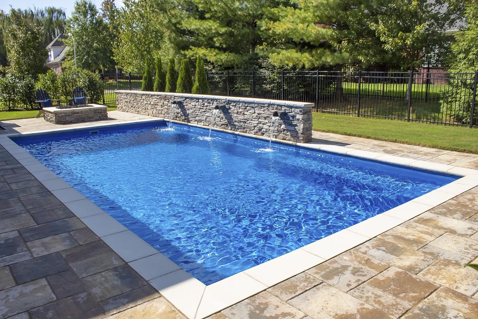 The Leisure Pools Supreme™ Inground Pool - Backyard Pool and Patio